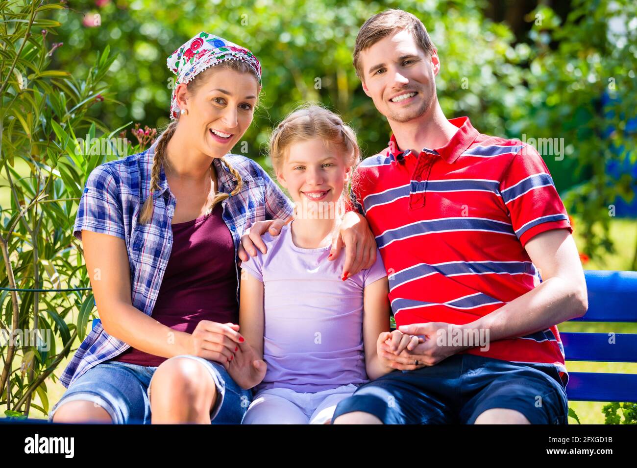 Daughter mom sitting on bench hi-res stock photography and images - Alamy