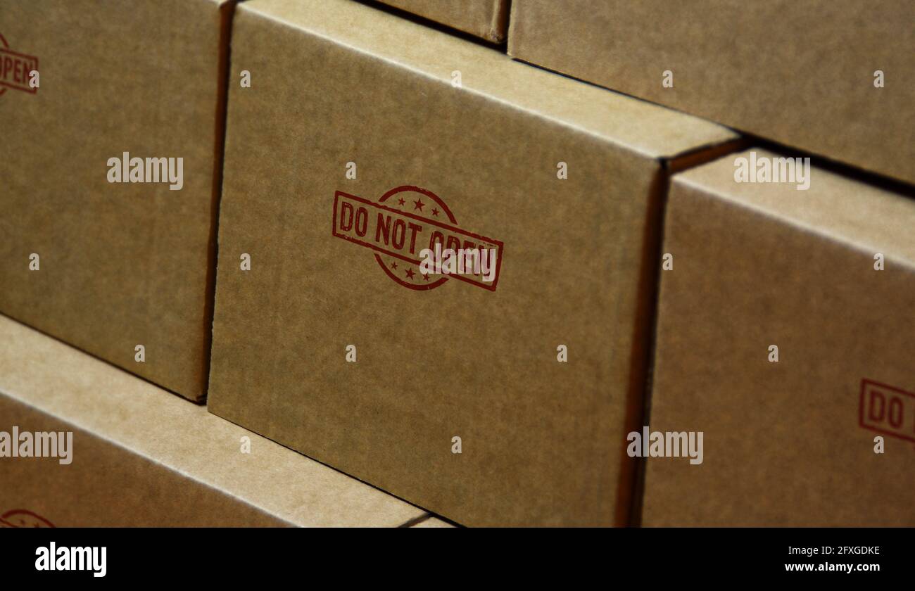 Do not open stamp printed on cardboard box. Secret and confidential ...