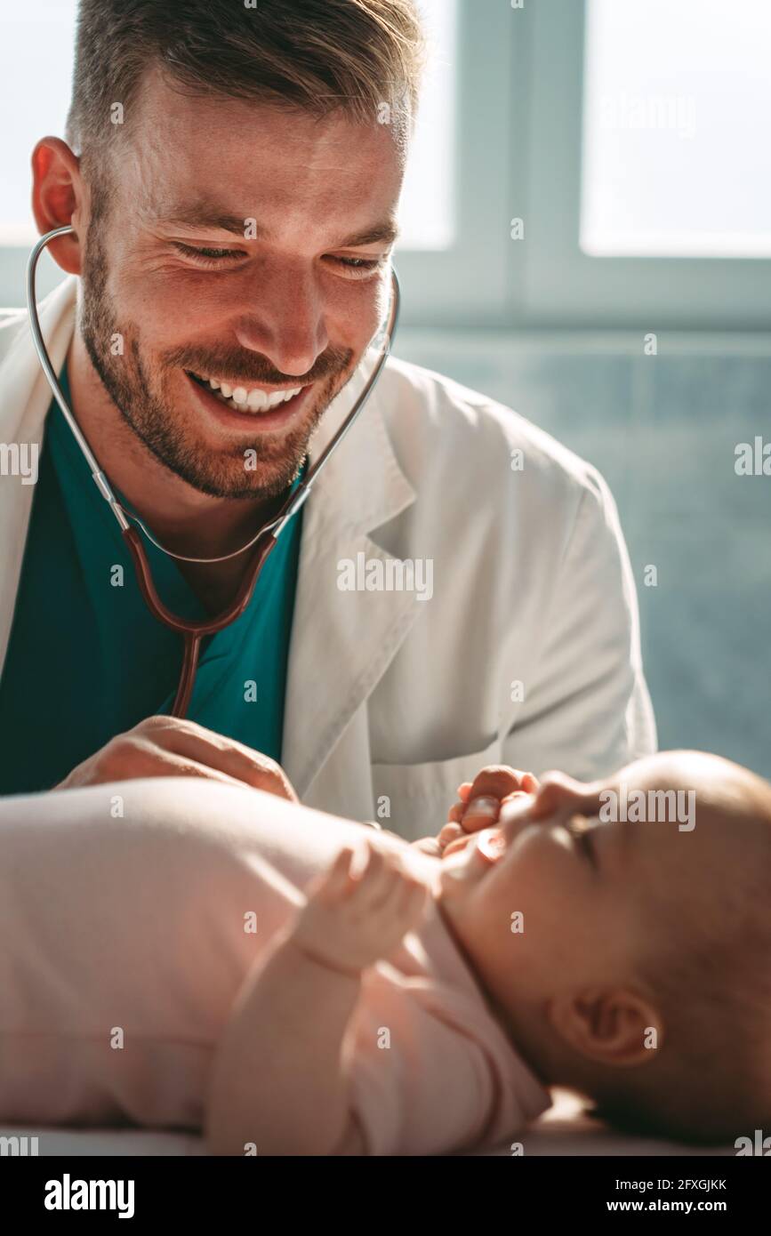Pediatric doctor exams little baby. Health care, medical examination ...