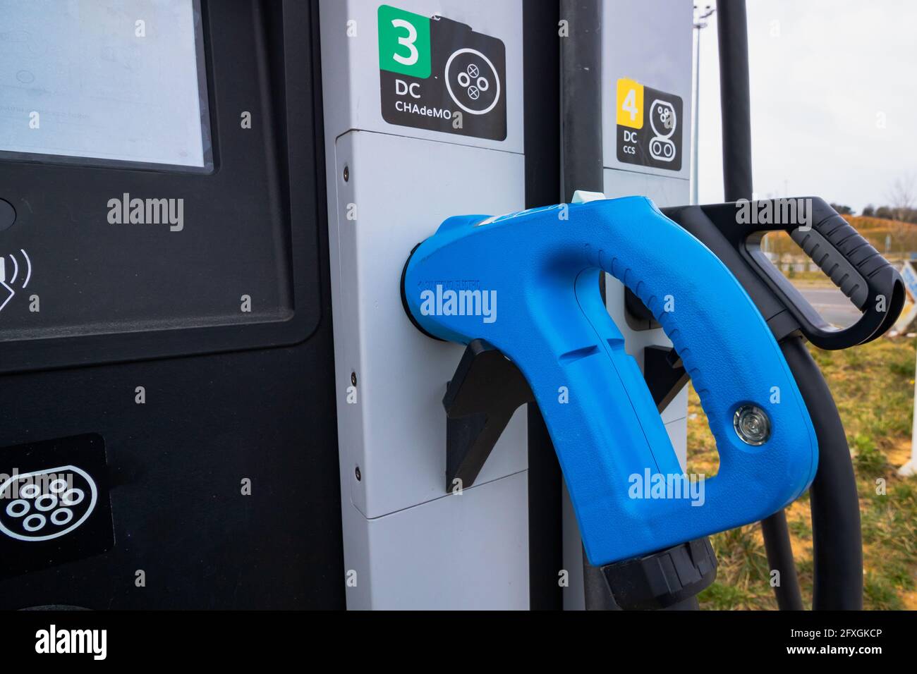 Types of EV chargers in EV Charger station in focus. AC EV charger ...