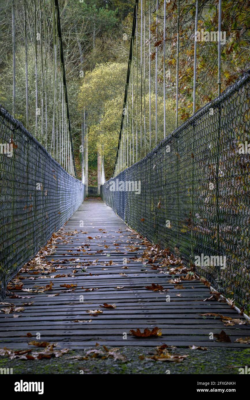 Perspective view cable wood bridge hi-res stock photography and images ...