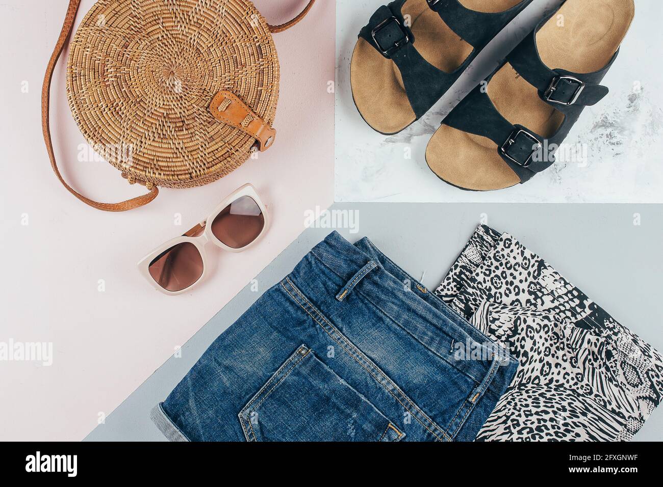 Flat lay with summer women's clothing and accessories. Animal print t ...
