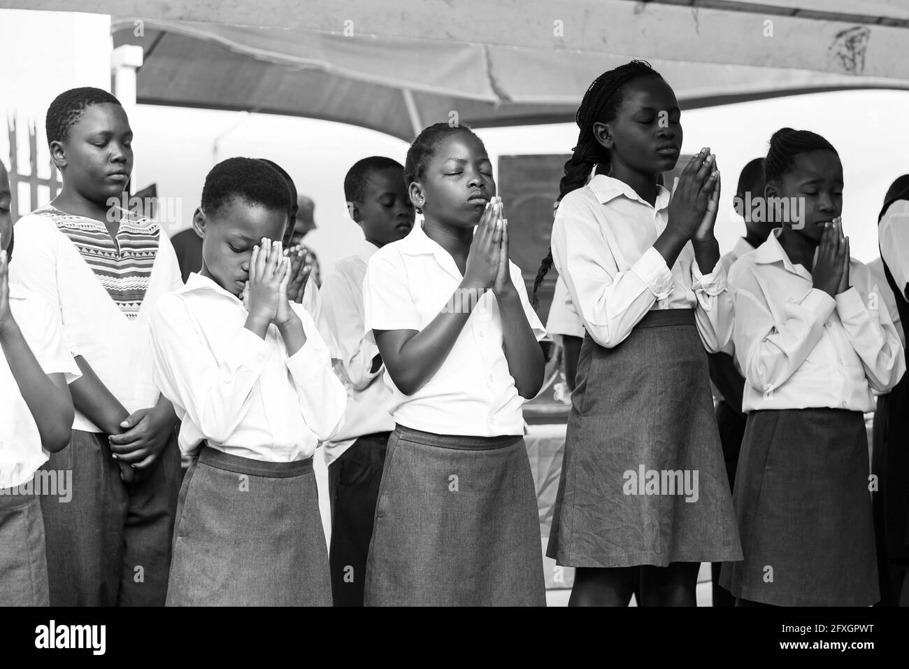 Africa school girls uniform Black and White Stock Photos & Images - Alamy