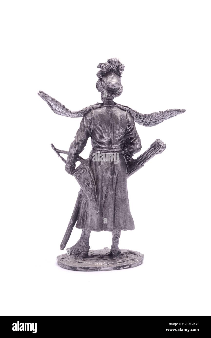 tin soldier Cossack figurine with wings isolated on white Stock Photo ...