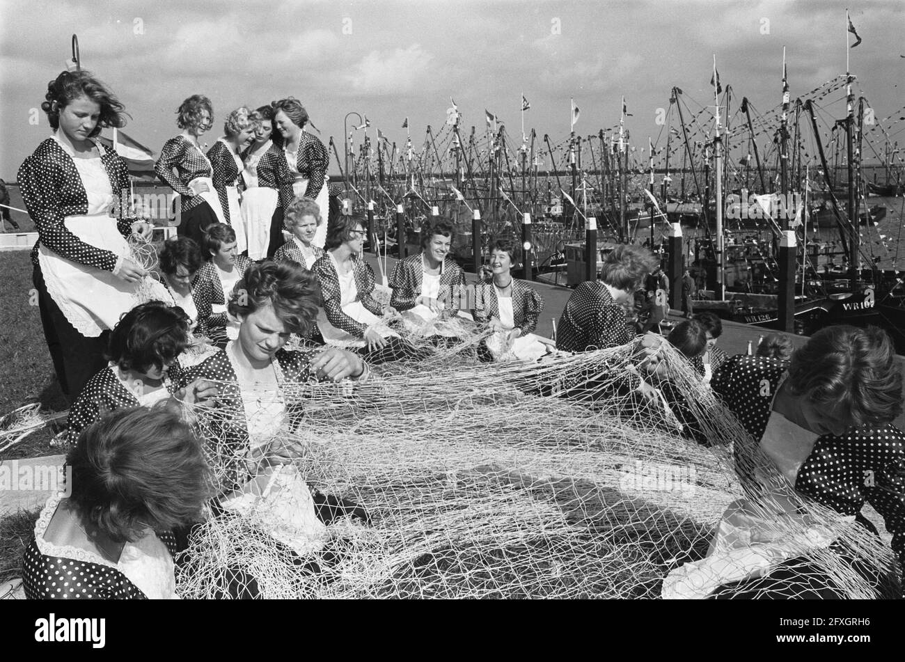 Women mending nets Black and White Stock Photos & Images - Alamy