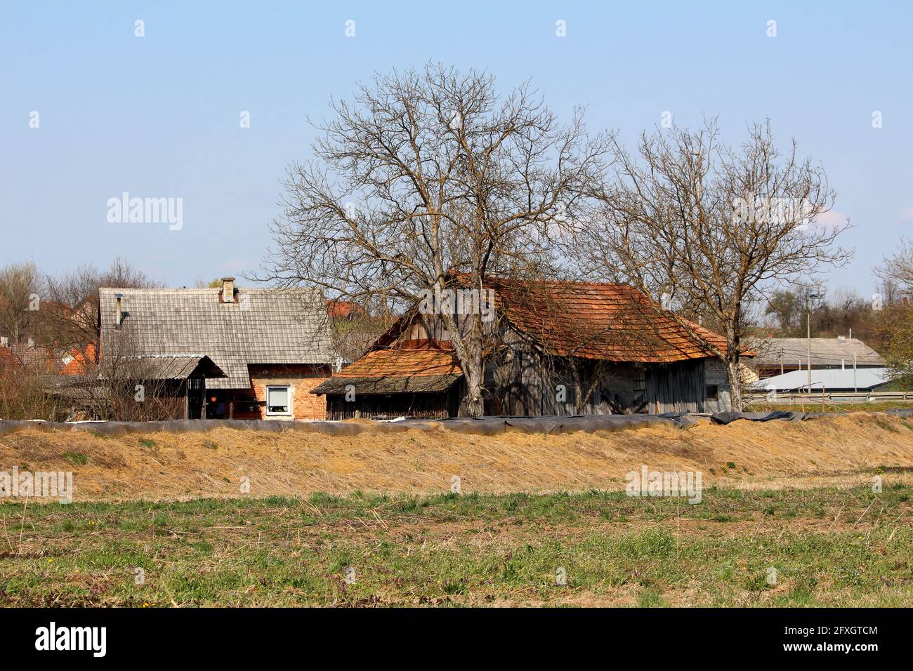 Temporary flood protection wall made of box barriers and sandbags ...