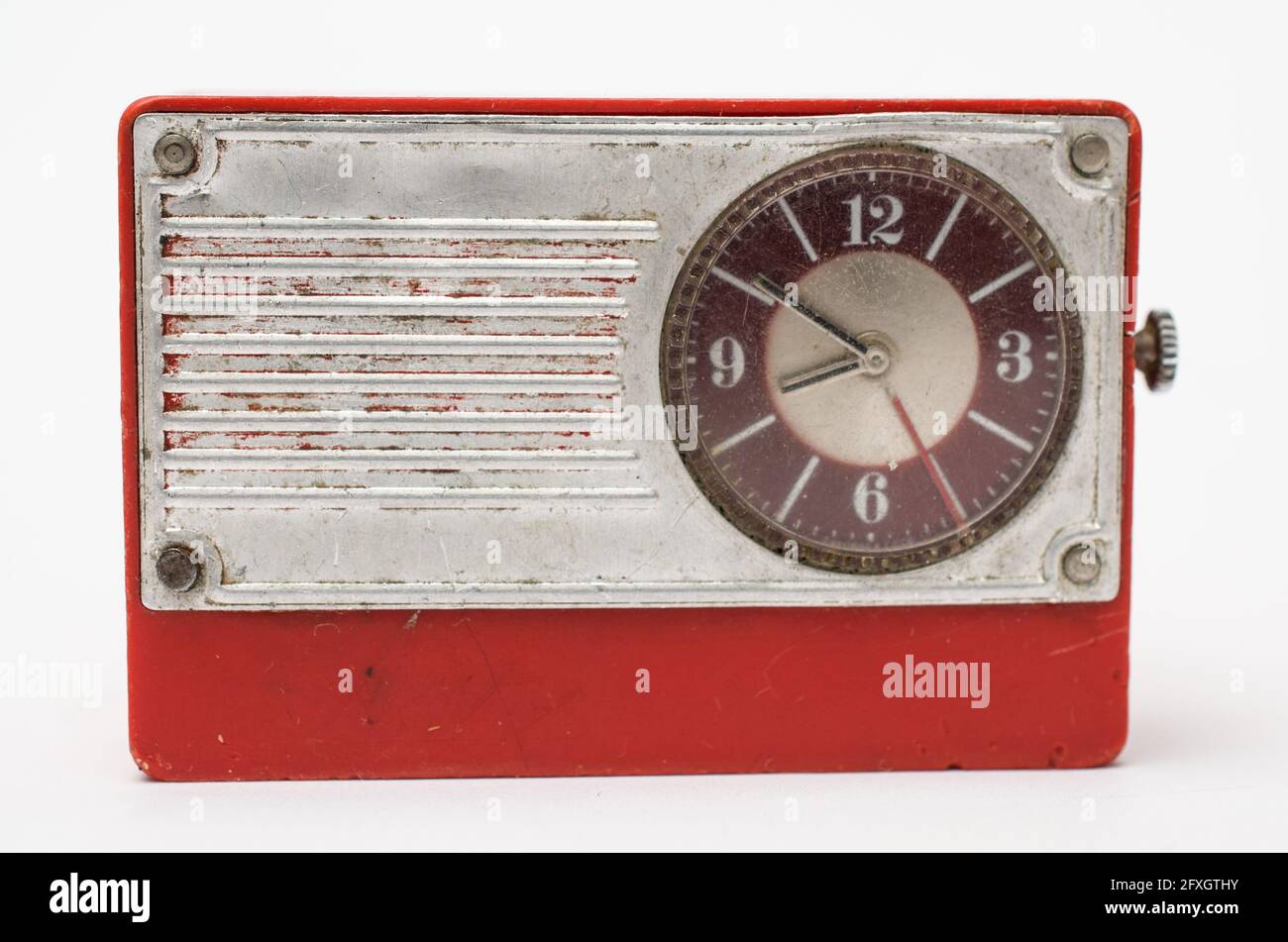 Red retro alarm clock on a white background Stock Photo - Alamy