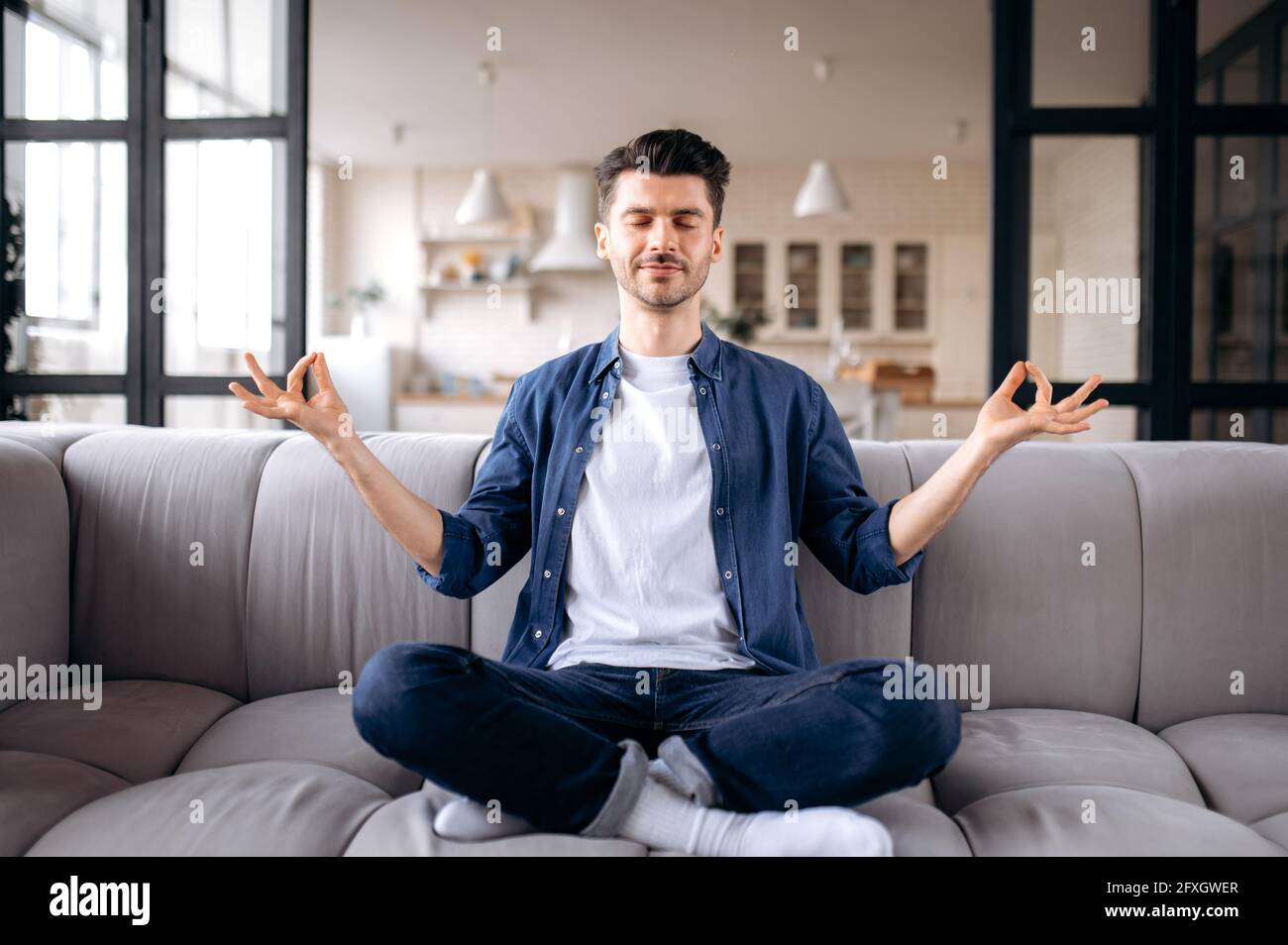 Relaxed attractive young caucasian man, calm pacified guy in casual ...