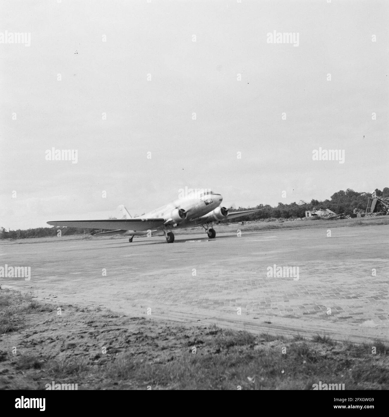 Aircraft lands on a runway of an airfield, September 1, 1945, visits ...