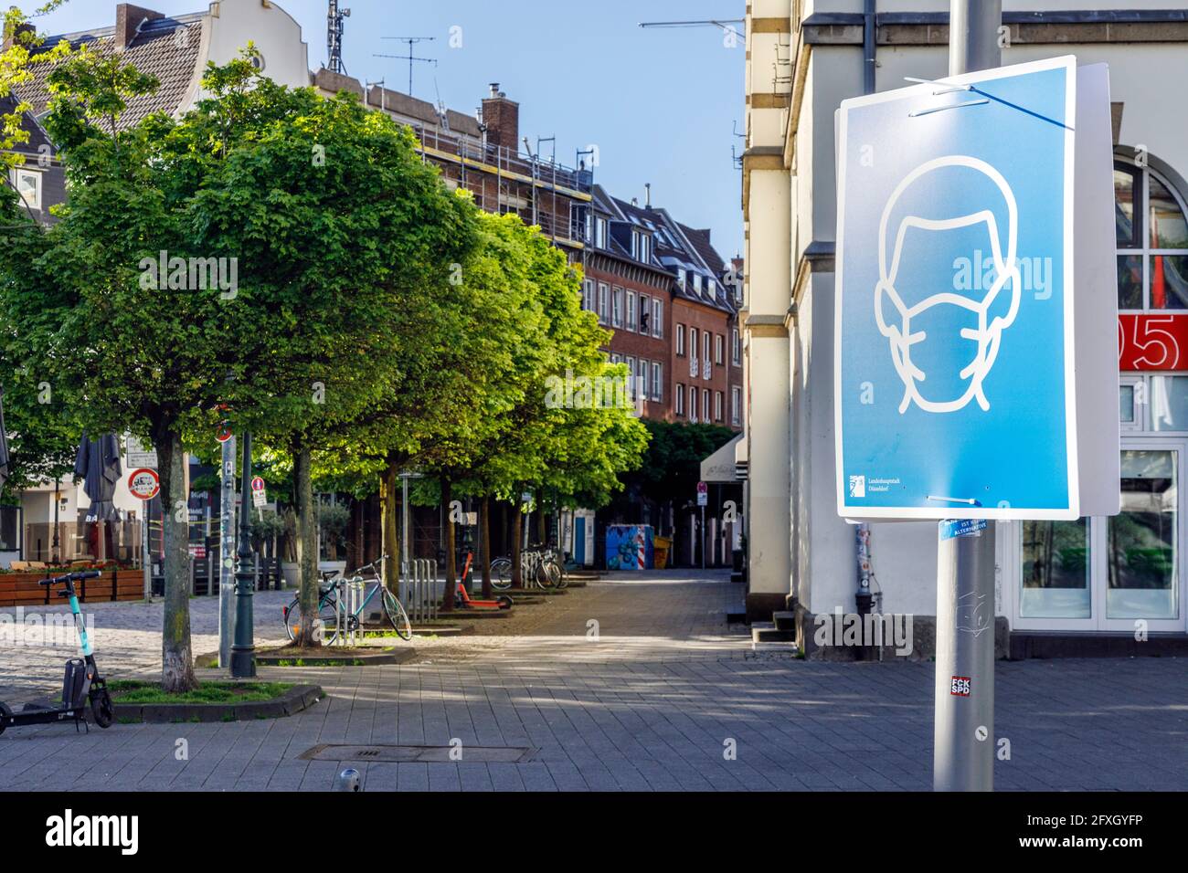 Mask compulsory in the city center Stock Photo - Alamy