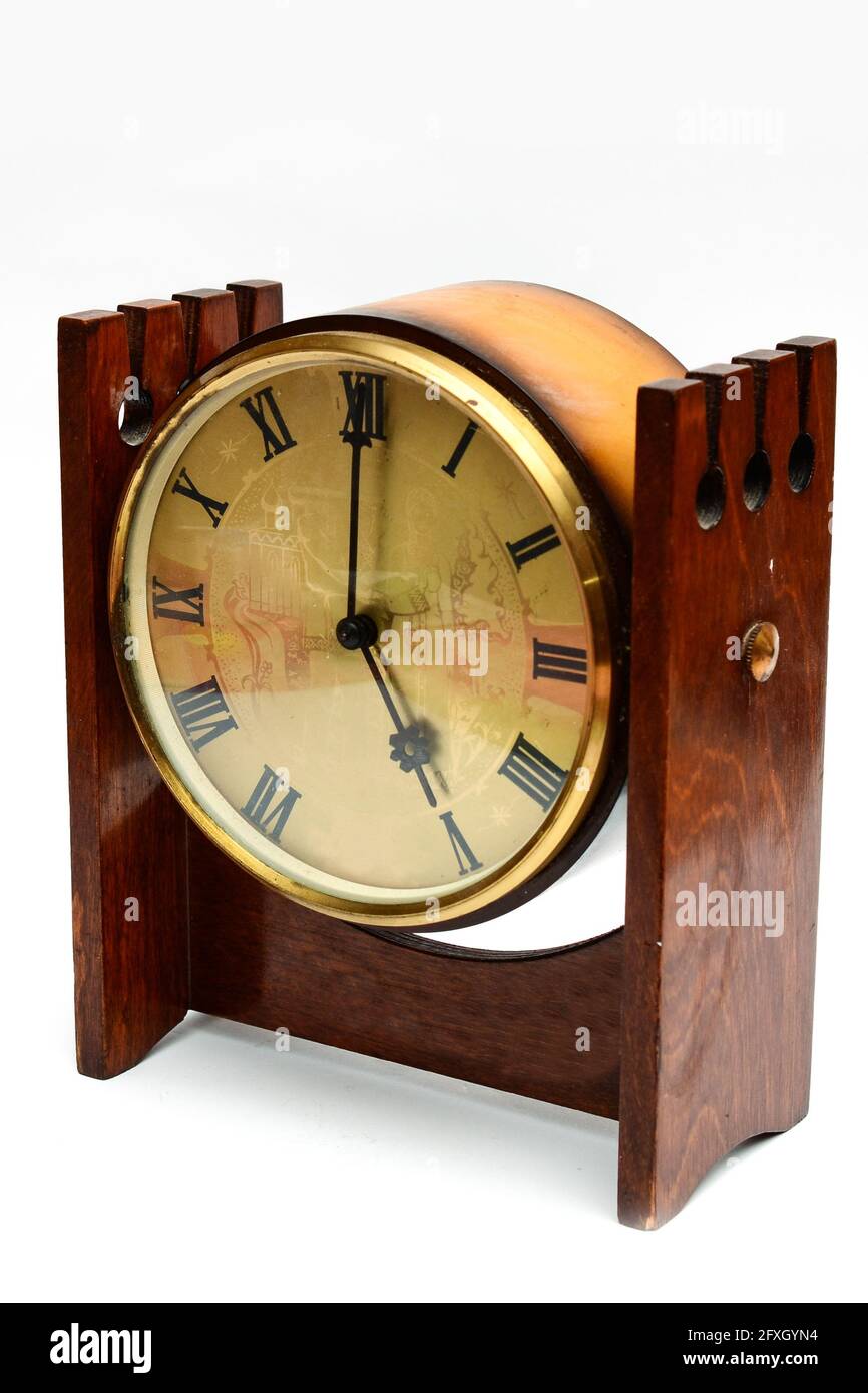 old table clock on a white background Stock Photo - Alamy