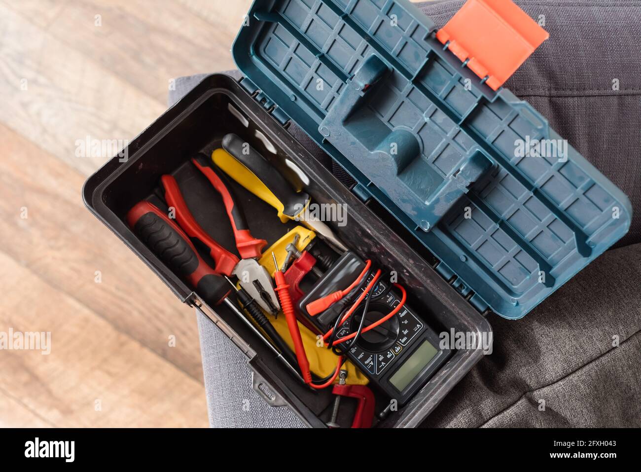 top view of modern toolbox with different instruments Stock Photo - Alamy
