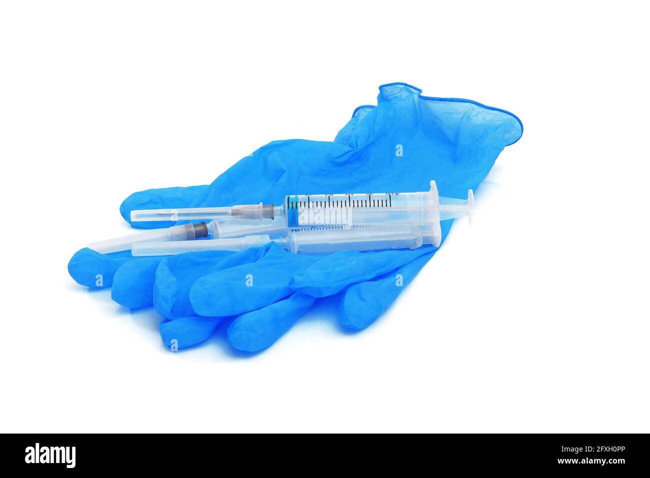 disposable medical gloves and syringe isolated on white background ...