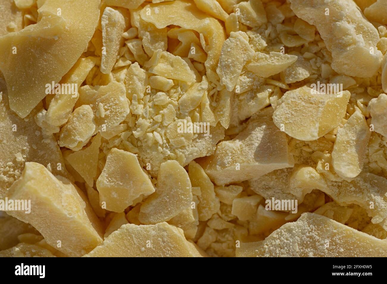 Pieces of crushed cocoa butter. Chopped cocoa oil, natural ingredient ...