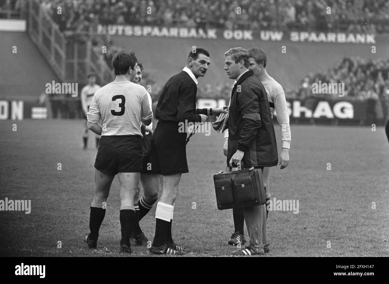 Referee talking soccer Black and White Stock Photos & Images - Alamy