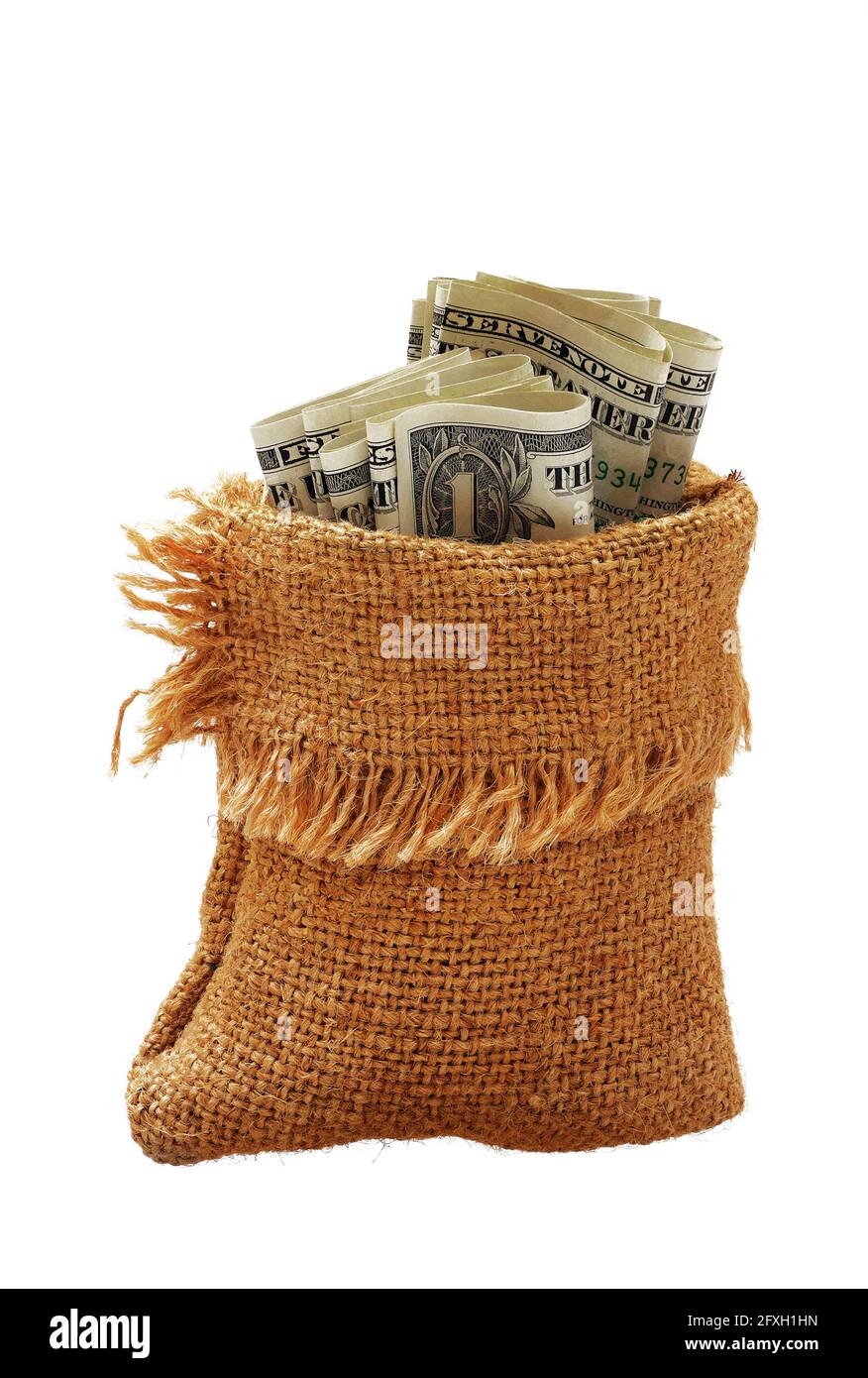 burlap sack filled with folded dollar banknotes isolated on white ...