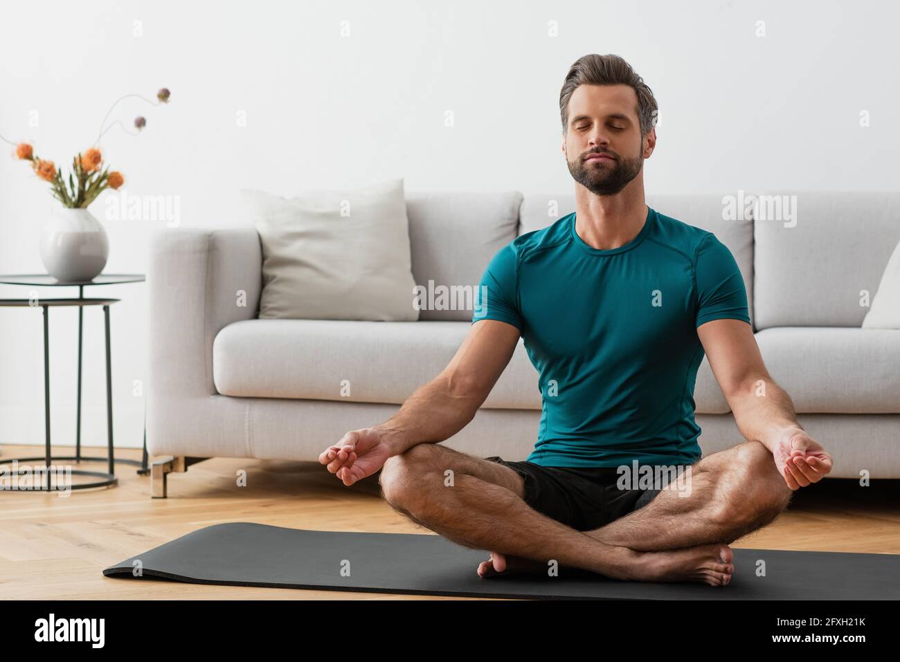 One handsome man meditating hi-res stock photography and images - Alamy