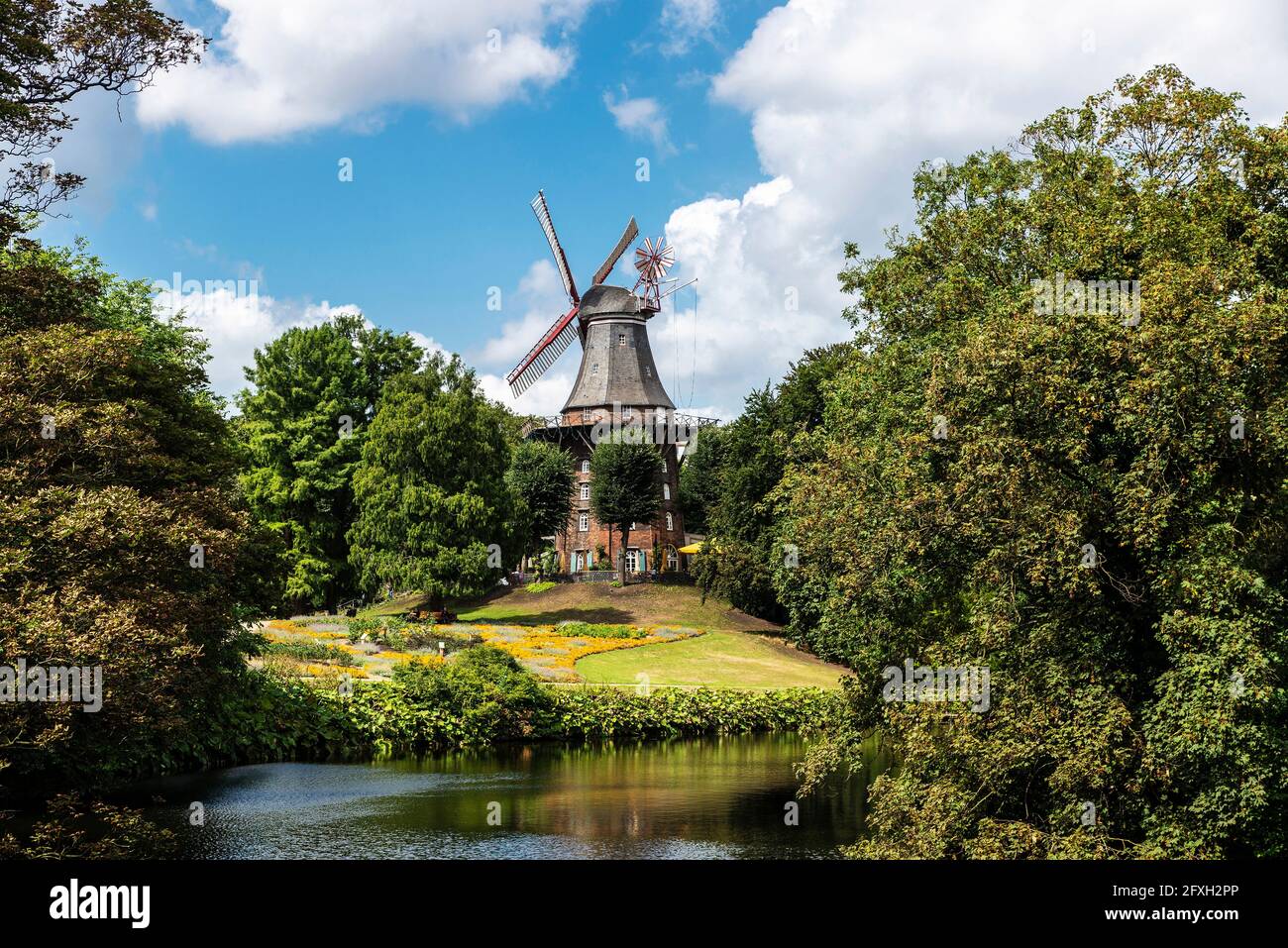 Landscape of an old historic windmill in a park in Bremen, Germany ...