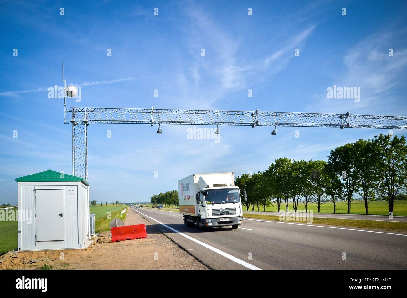 BELARUS: 25.06.2013 - Road toll. Gate with barriers by toll road on a ...