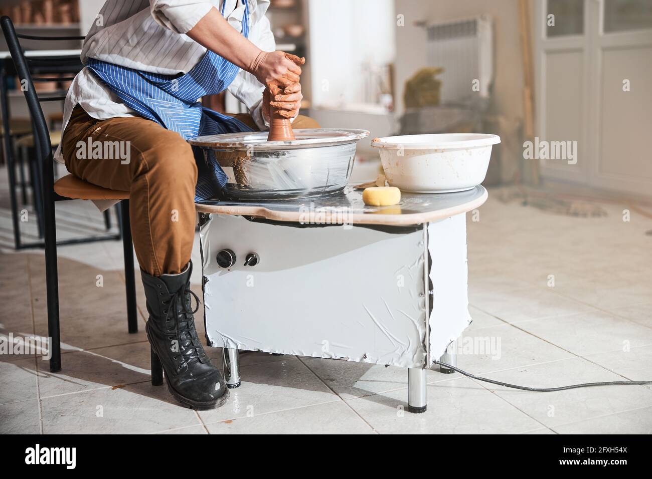 Potter wheel statue hi-res stock photography and images - Alamy