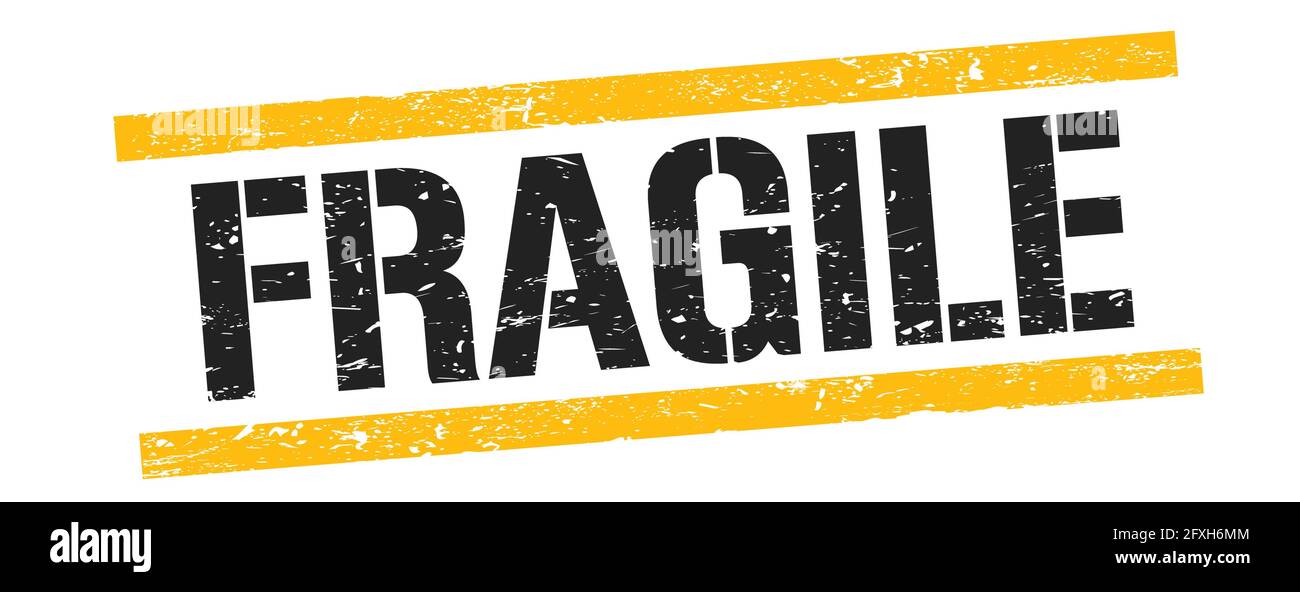 FRAGILE text on black yellow grungy lines stamp sign Stock Photo - Alamy