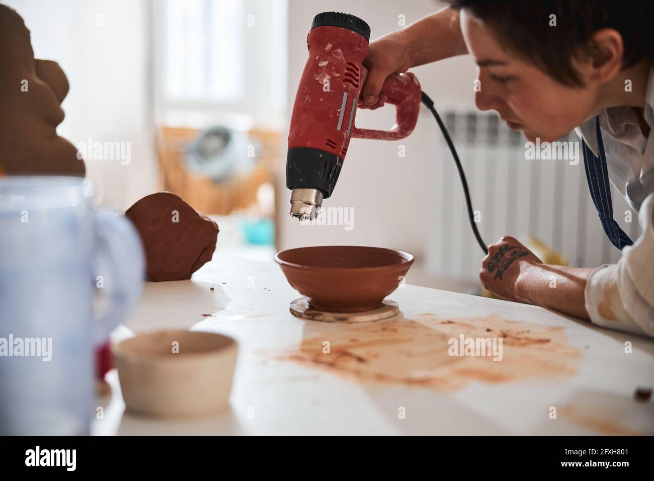 Attentive female person drying hi-res stock photography and images - Alamy