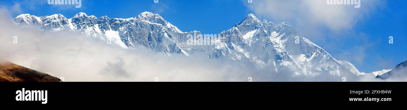 Top of mount Everest and Lhotse south rock face blue colored mountain ...