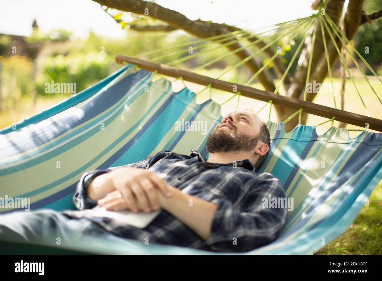 Man hammock garden hi-res stock photography and images - Alamy
