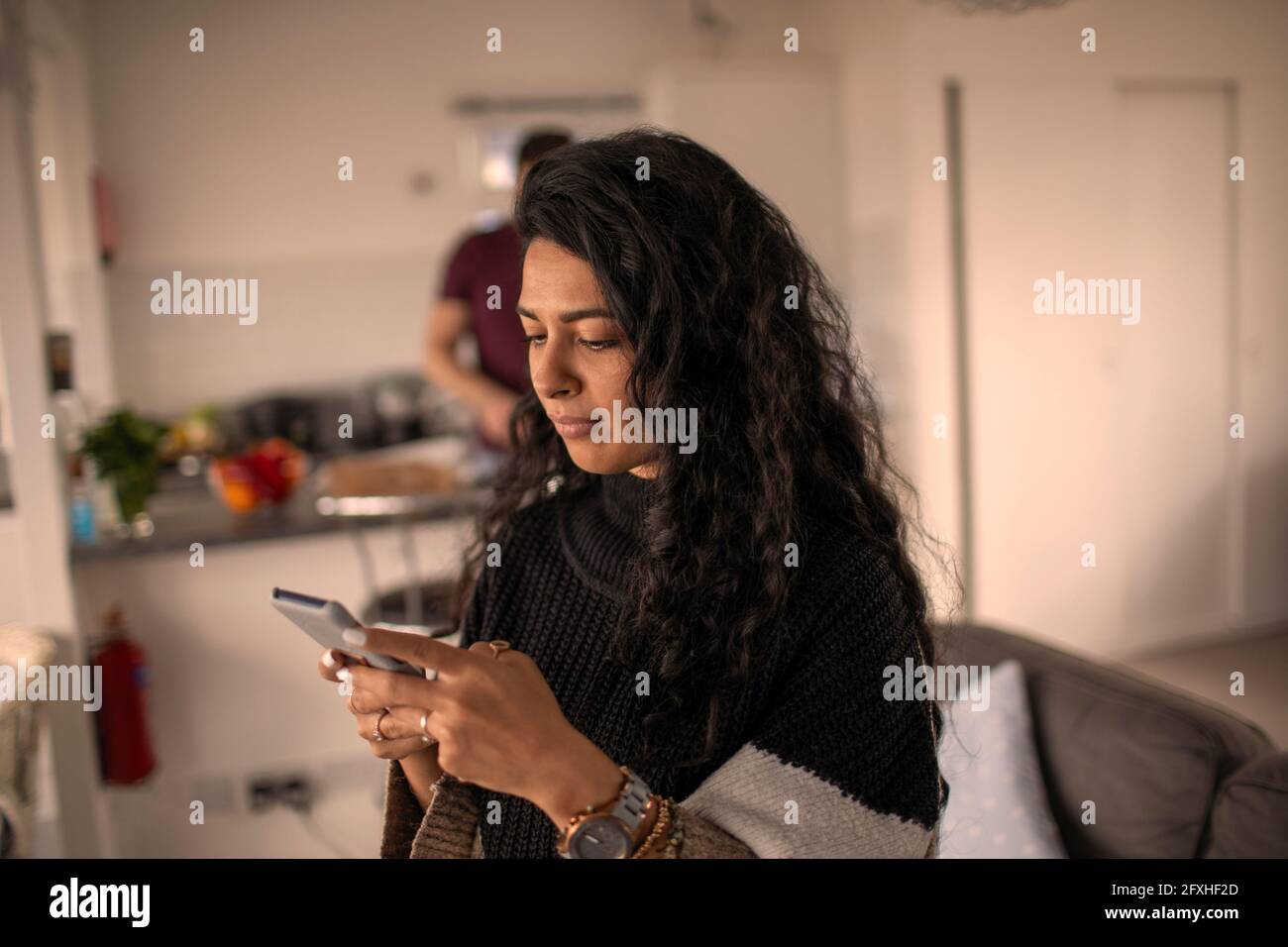 Woman looking smart home hi-res stock photography and images - Alamy