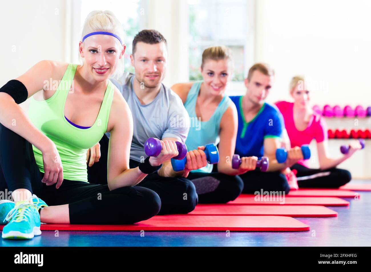 Group men working dumbbells gym hi-res stock photography and images - Alamy