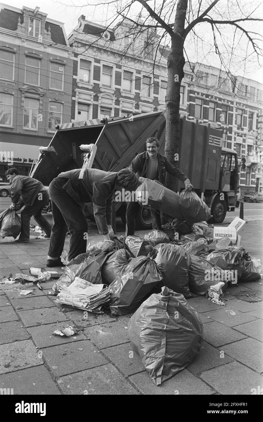 Garbage men throw garbage Black and White Stock Photos & Images - Alamy
