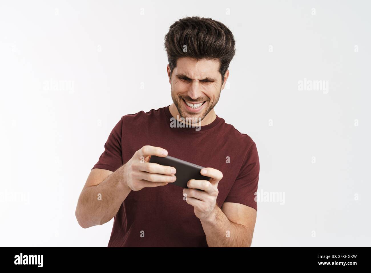 Tense handsome man playing hi-res stock photography and images - Alamy