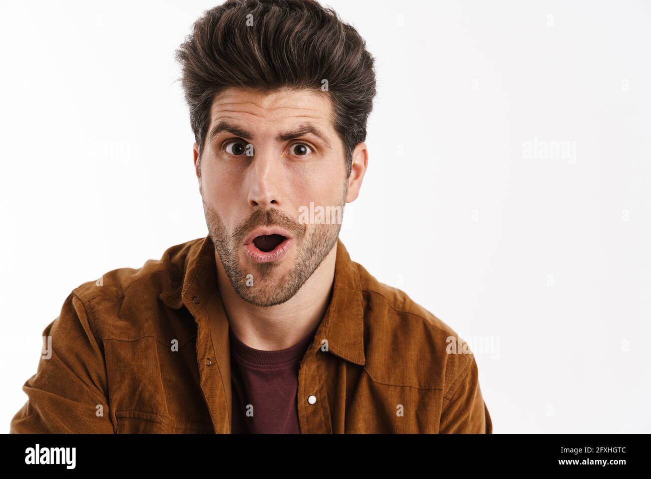 Handsome young man expressing hi-res stock photography and images - Alamy