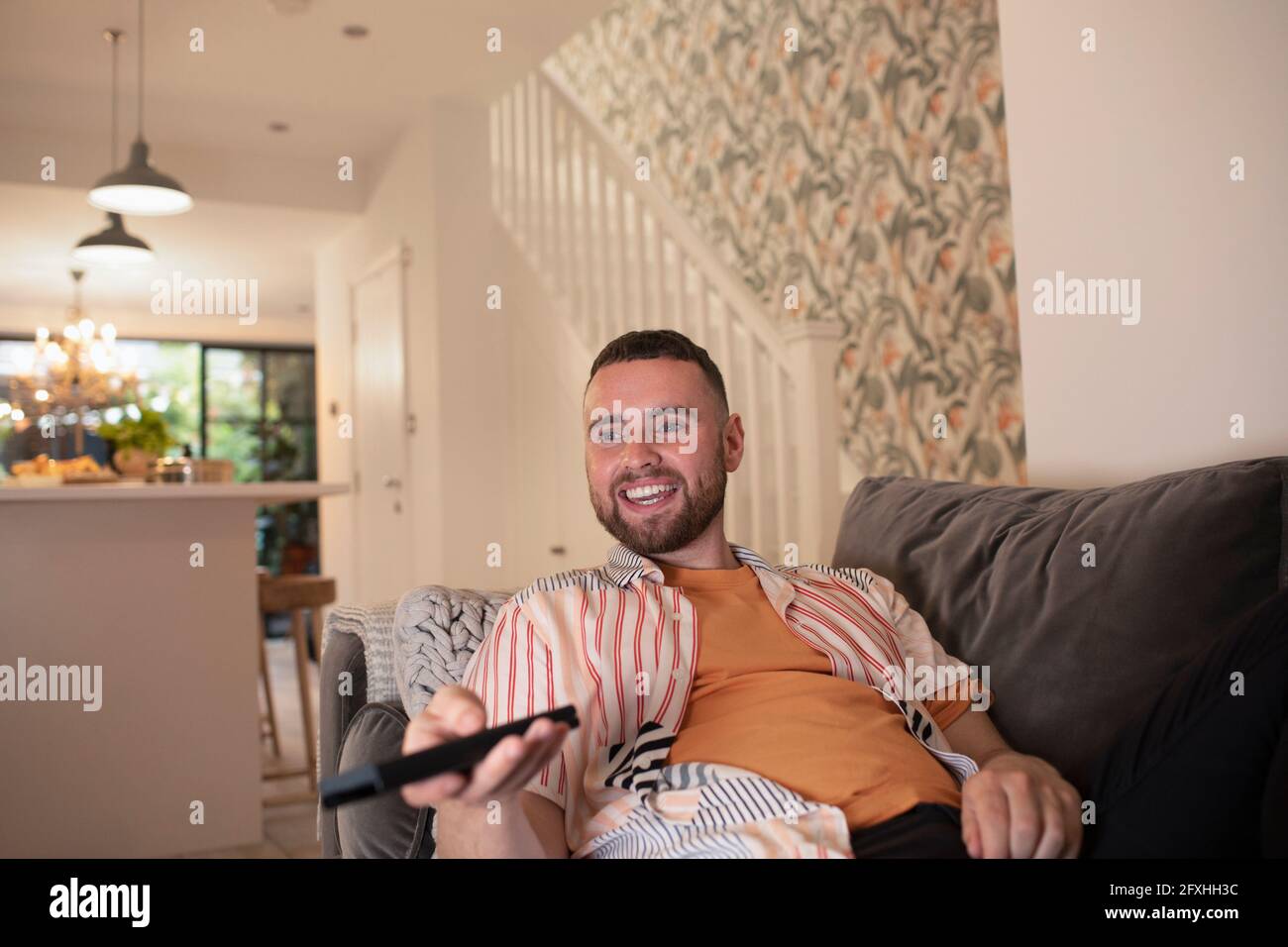 Remote control for television hi-res stock photography and images - Alamy