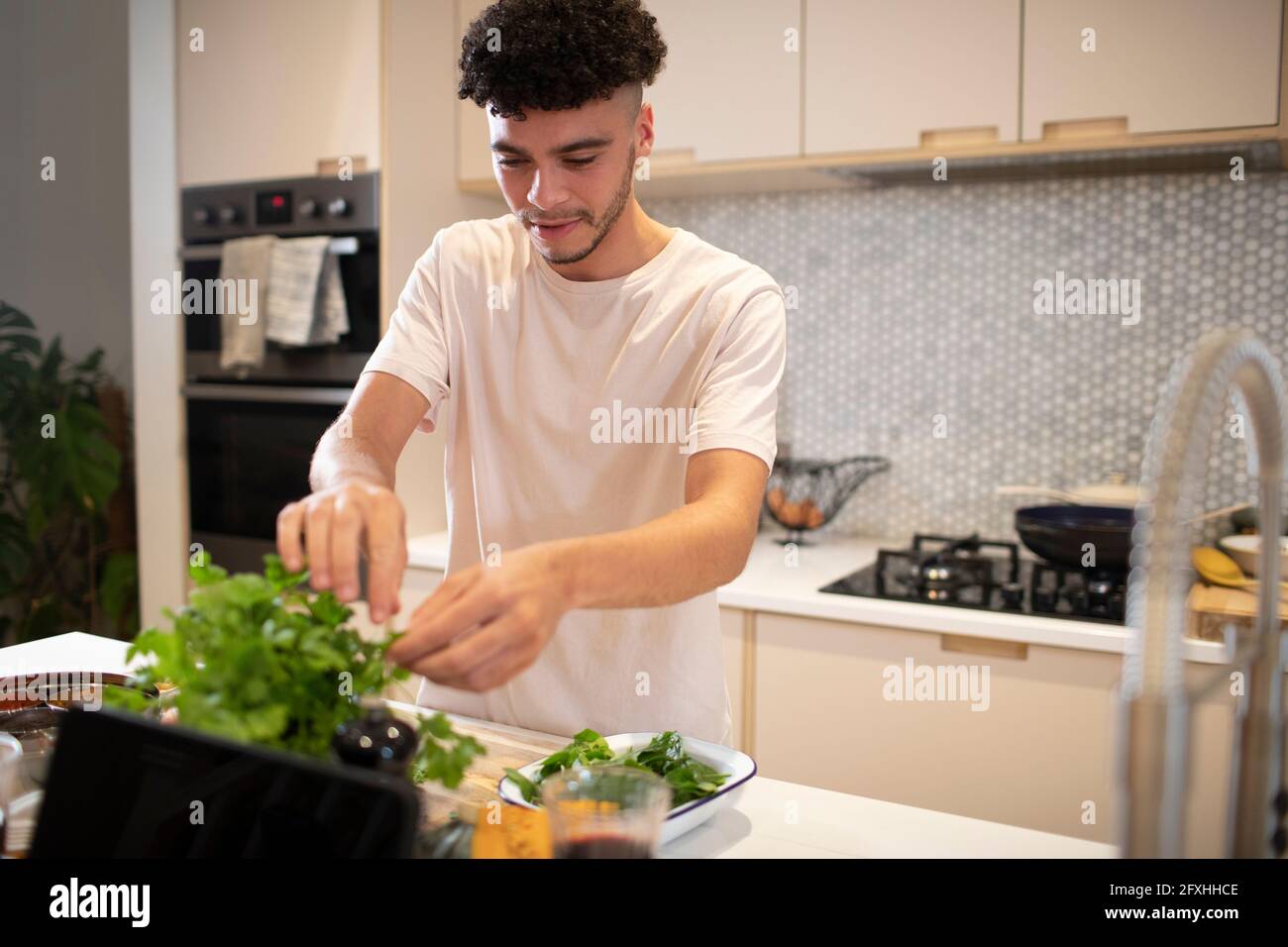 Kitchen island cooking hi-res stock photography and images - Alamy
