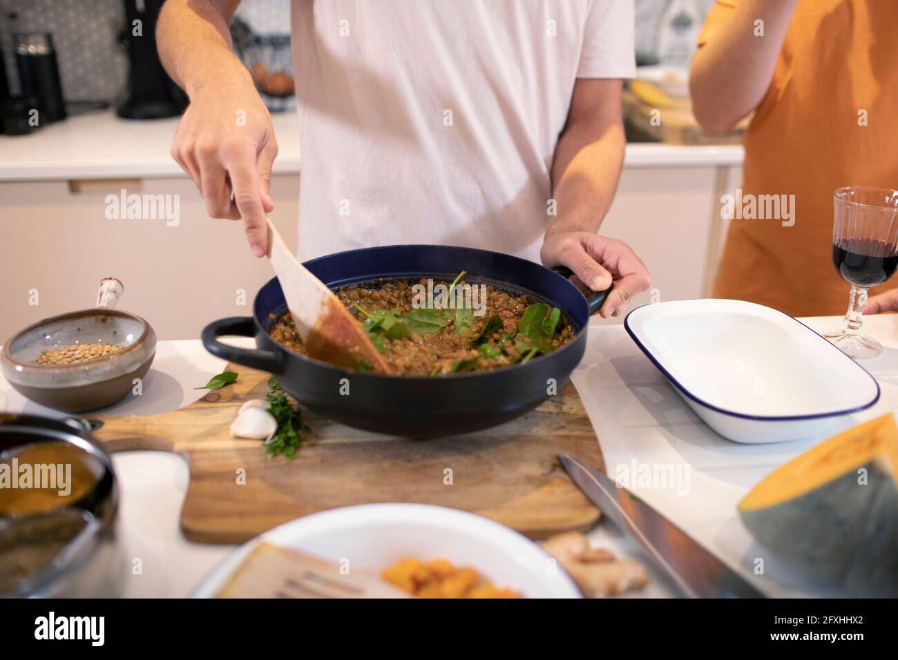 Man cooking in wok hi-res stock photography and images - Alamy