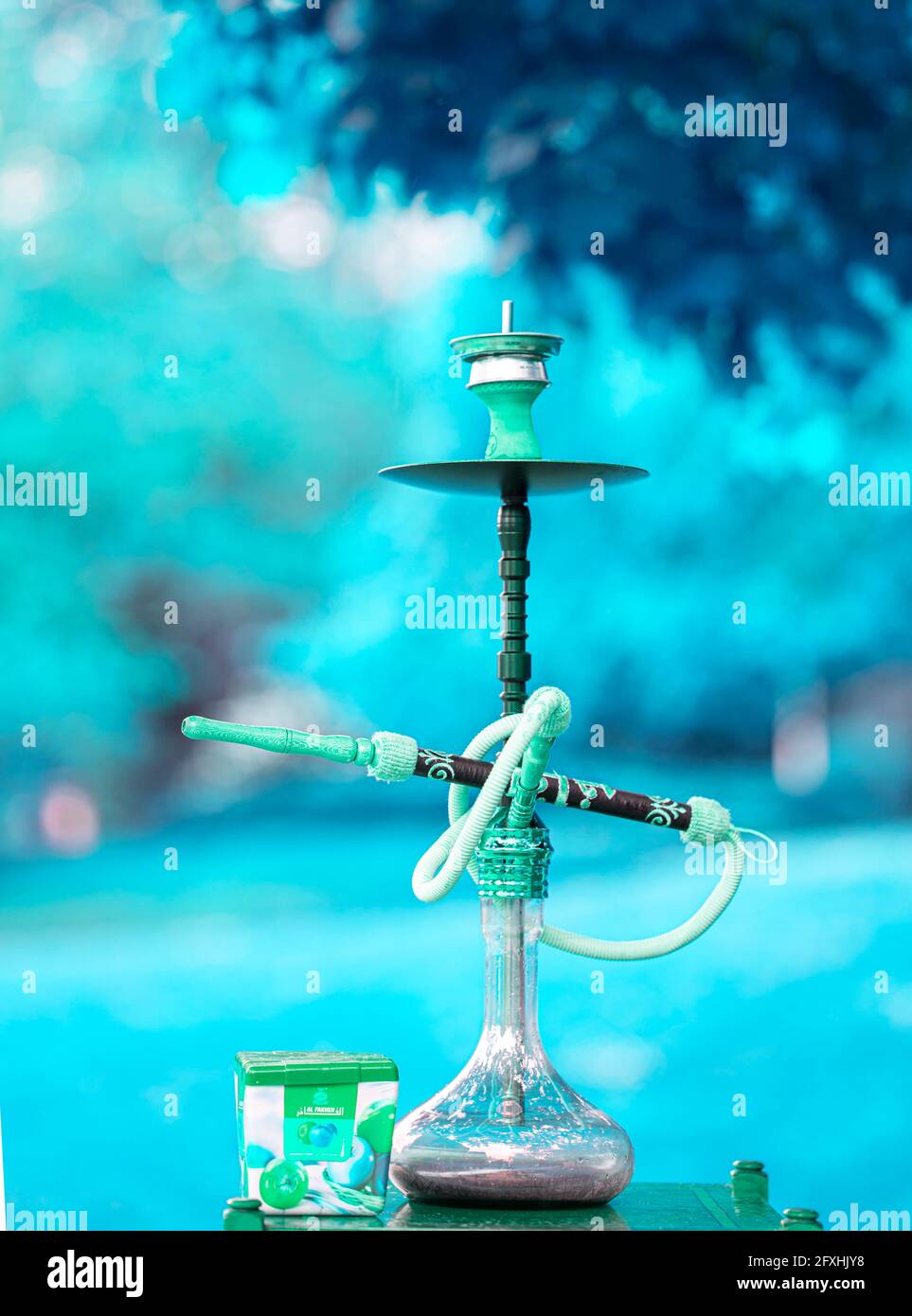 The head of a hookah, water pipe or shisha with glowing coal in the ...