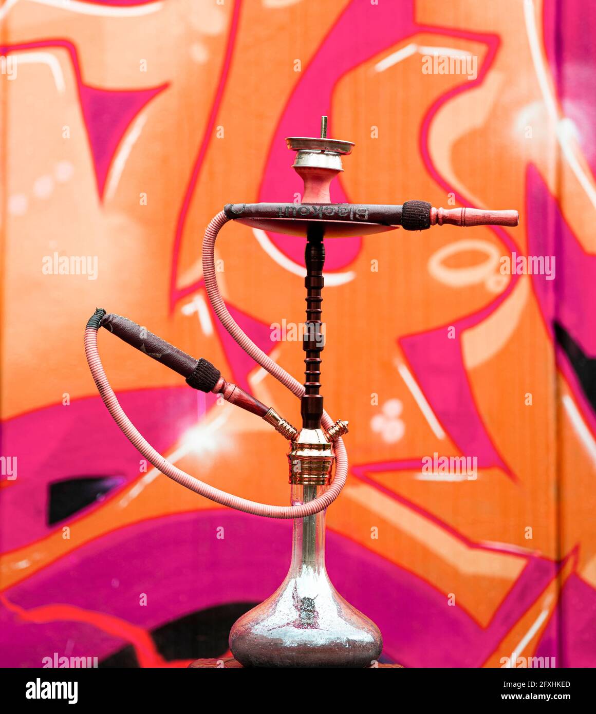 The head of a hookah, water pipe or shisha with glowing coal in the ...