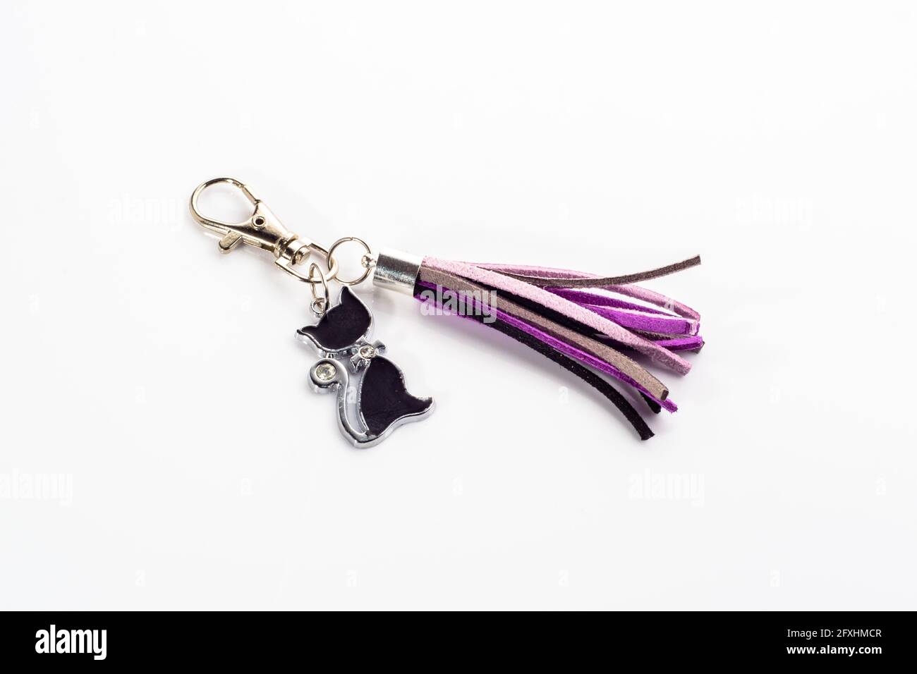 Fashionable key ring isolated on white, stylish boho jewelry Stock ...