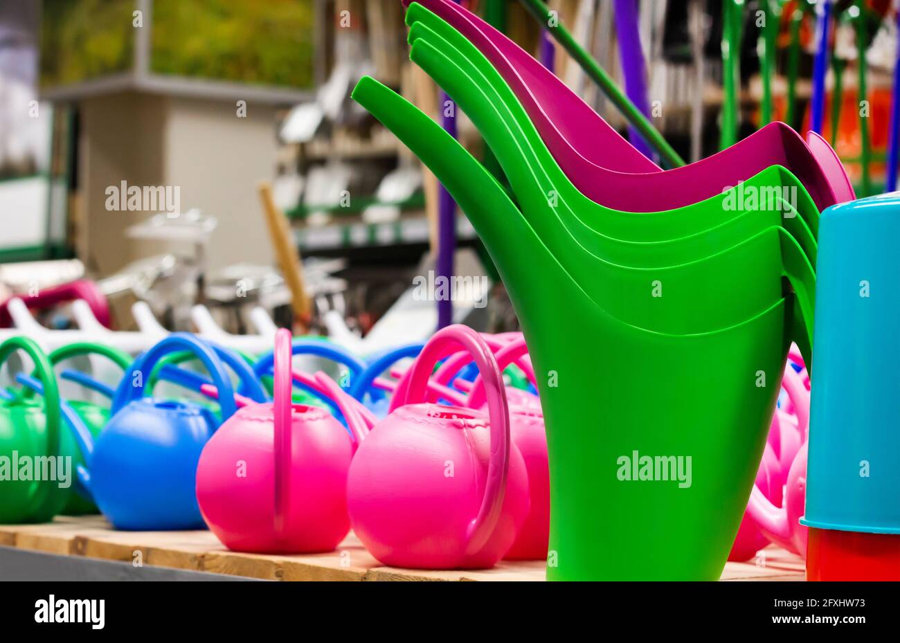Many Colorful Watering Cans High Resolution Stock Photography and ...