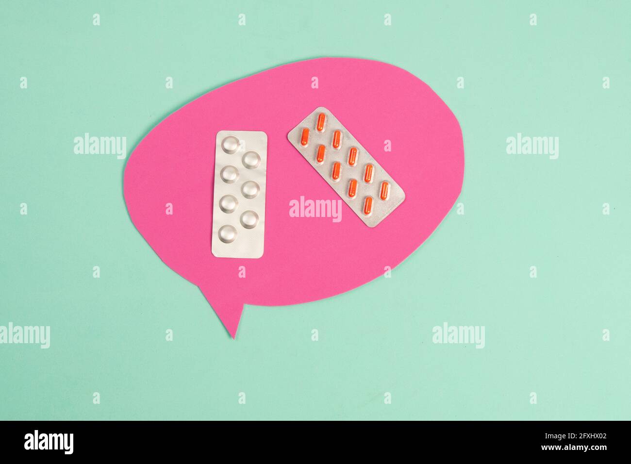 text balloon with medicine blister capsules symbolizing the ...