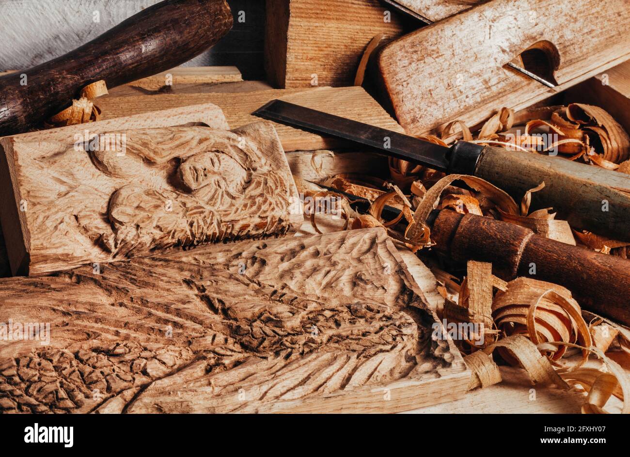 Photo of wooden old fashioned planes with carving chisels laying on ...