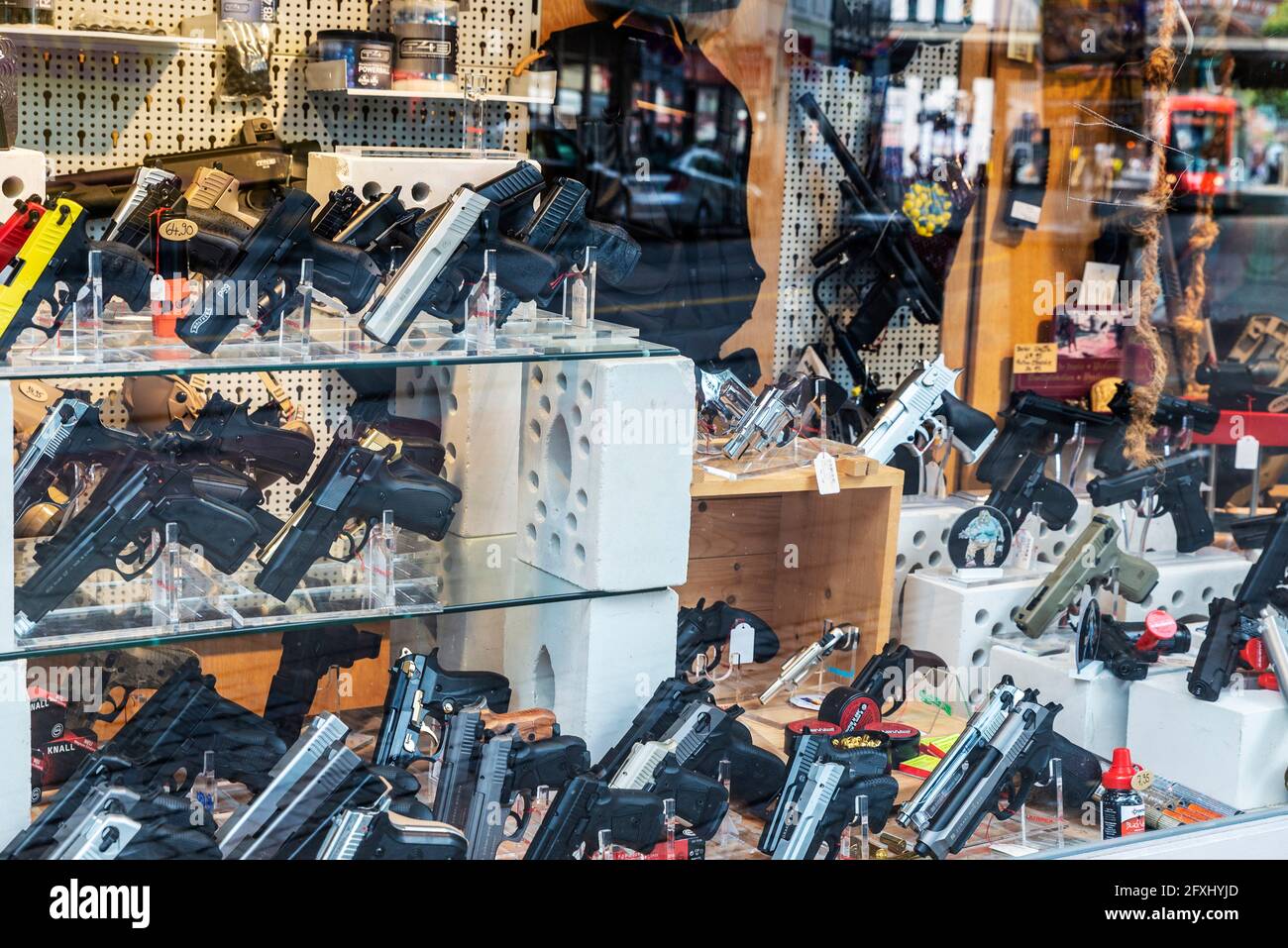 Bremen, Germany - August 19, 2019: Display of a gun shop with blank ...