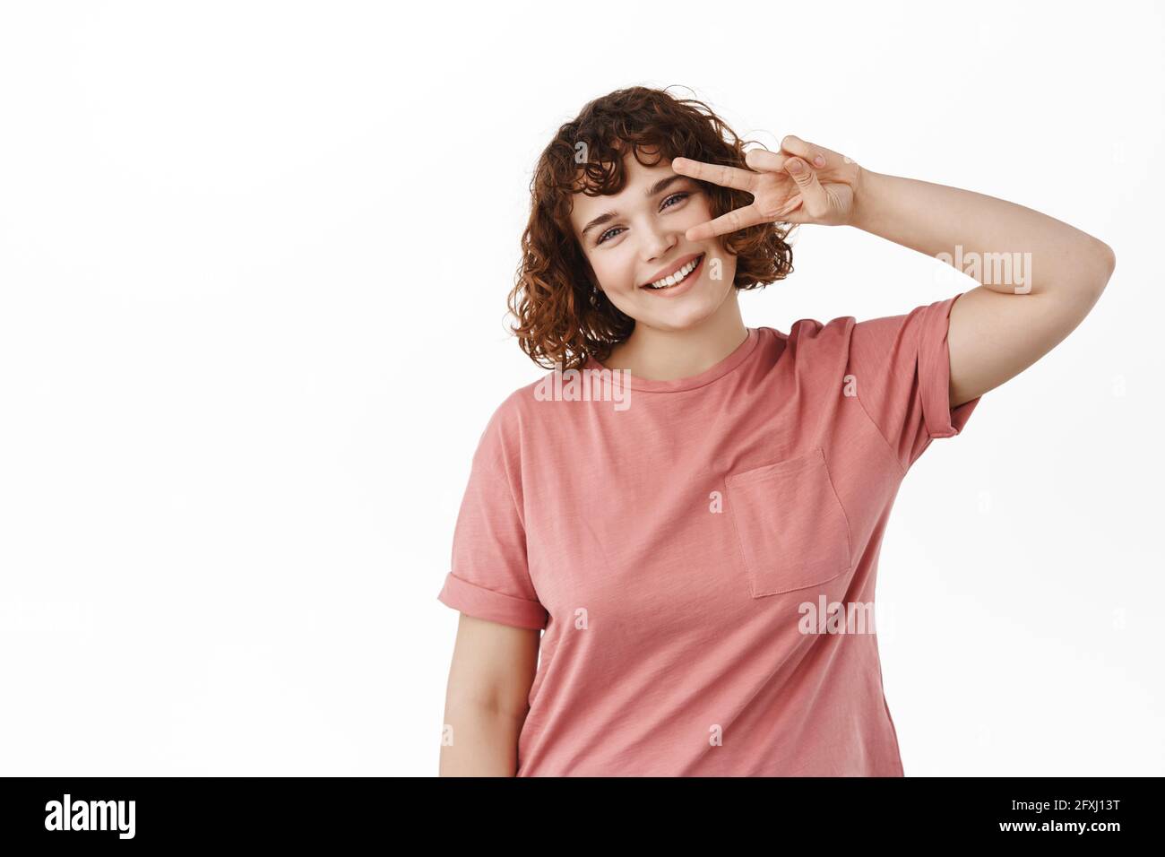 Positive cute girl smiling happy, showing peace kawaii v-sign and ...