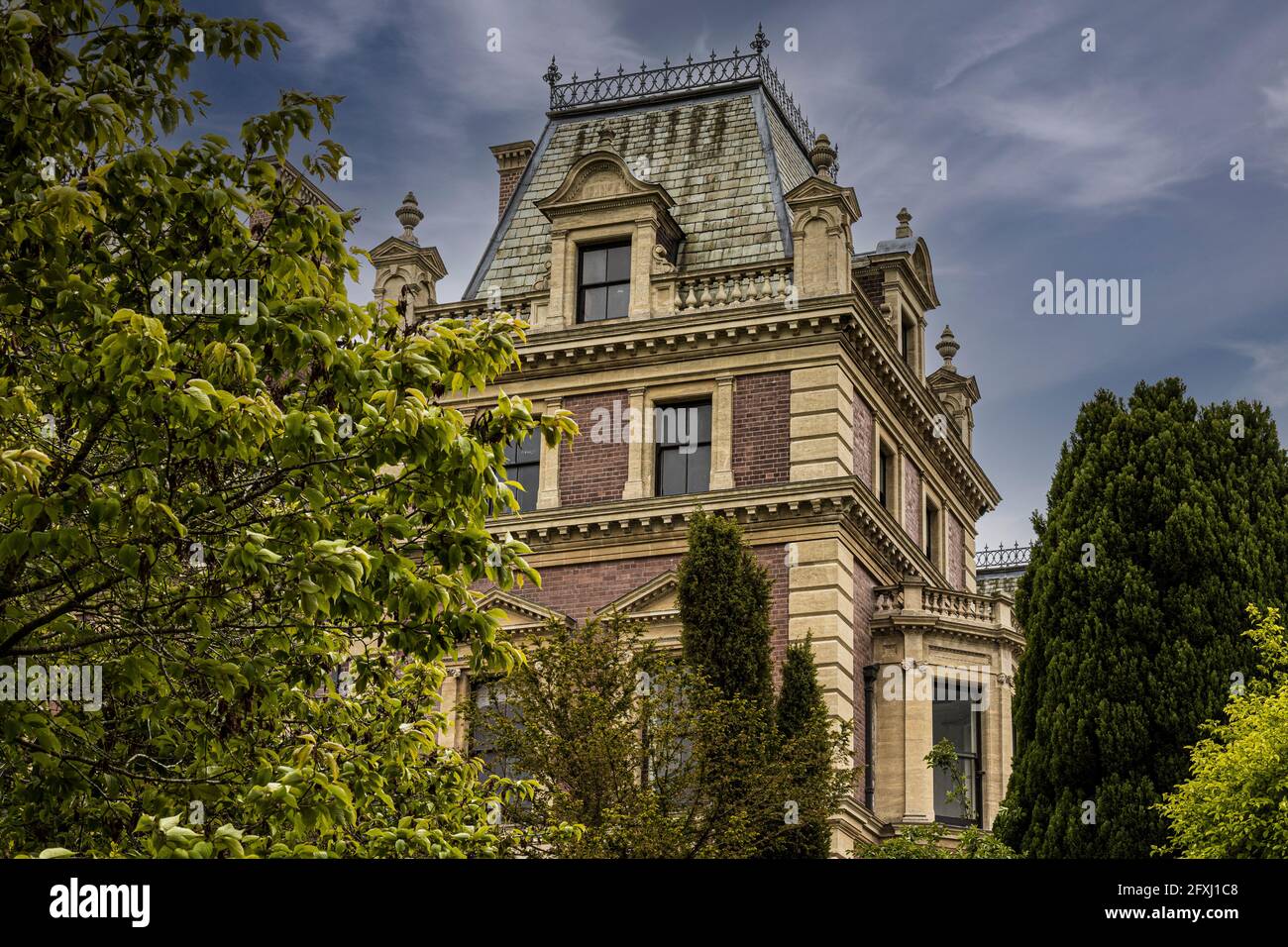 A building in the style of ` French Chateau in woodland setting Stock ...
