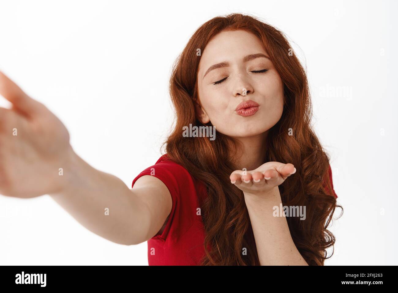 Romantic Redhead Woman Sending Air Kiss With Cute Flirty Face Taking