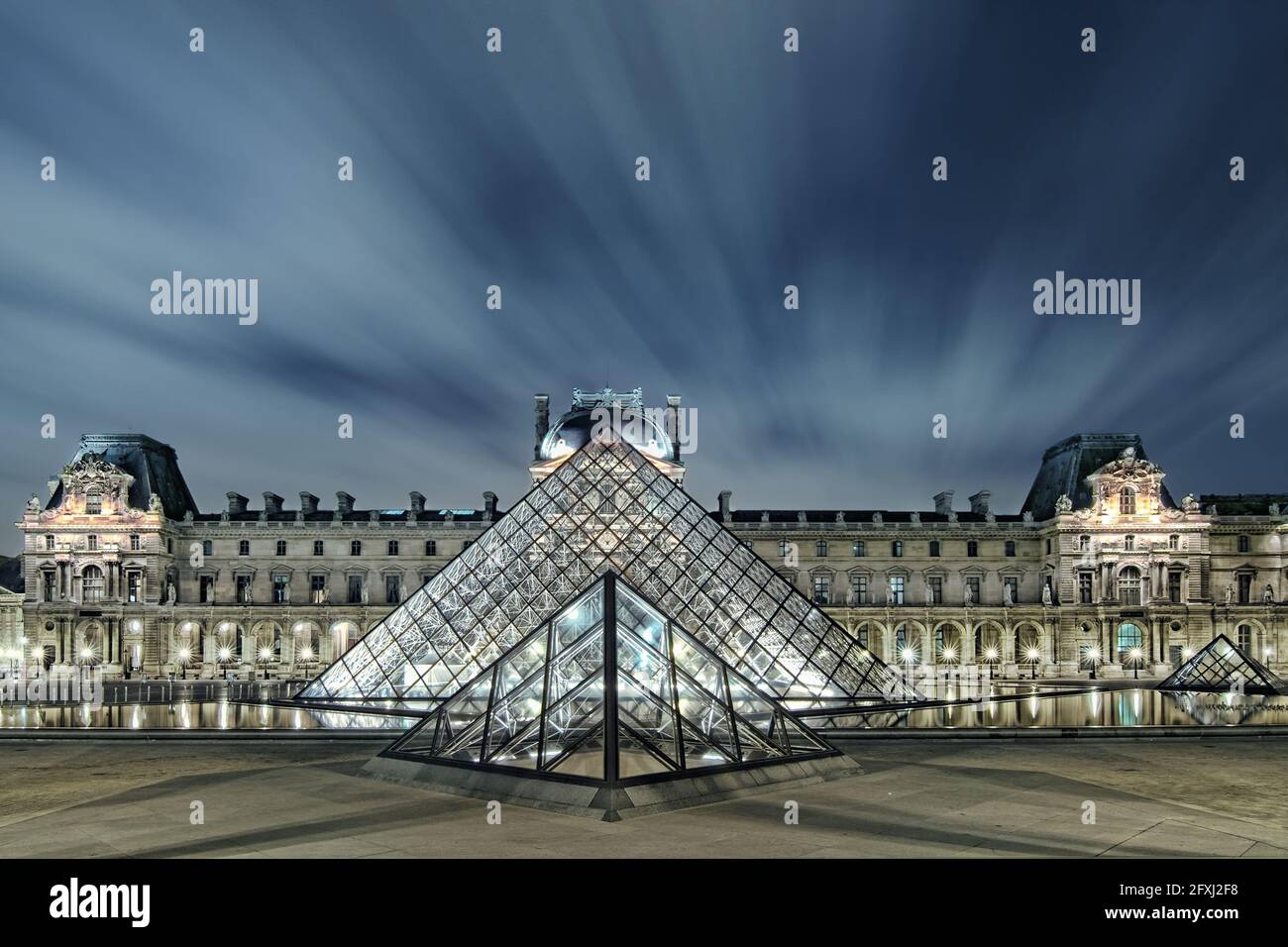 Louvre pyramide hi-res stock photography and images - Alamy