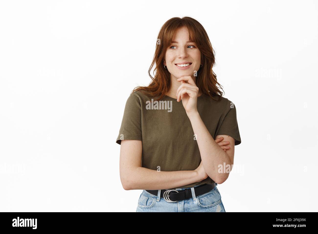 Image of smiling thoughtful girl has an idea, looking aside happy ...