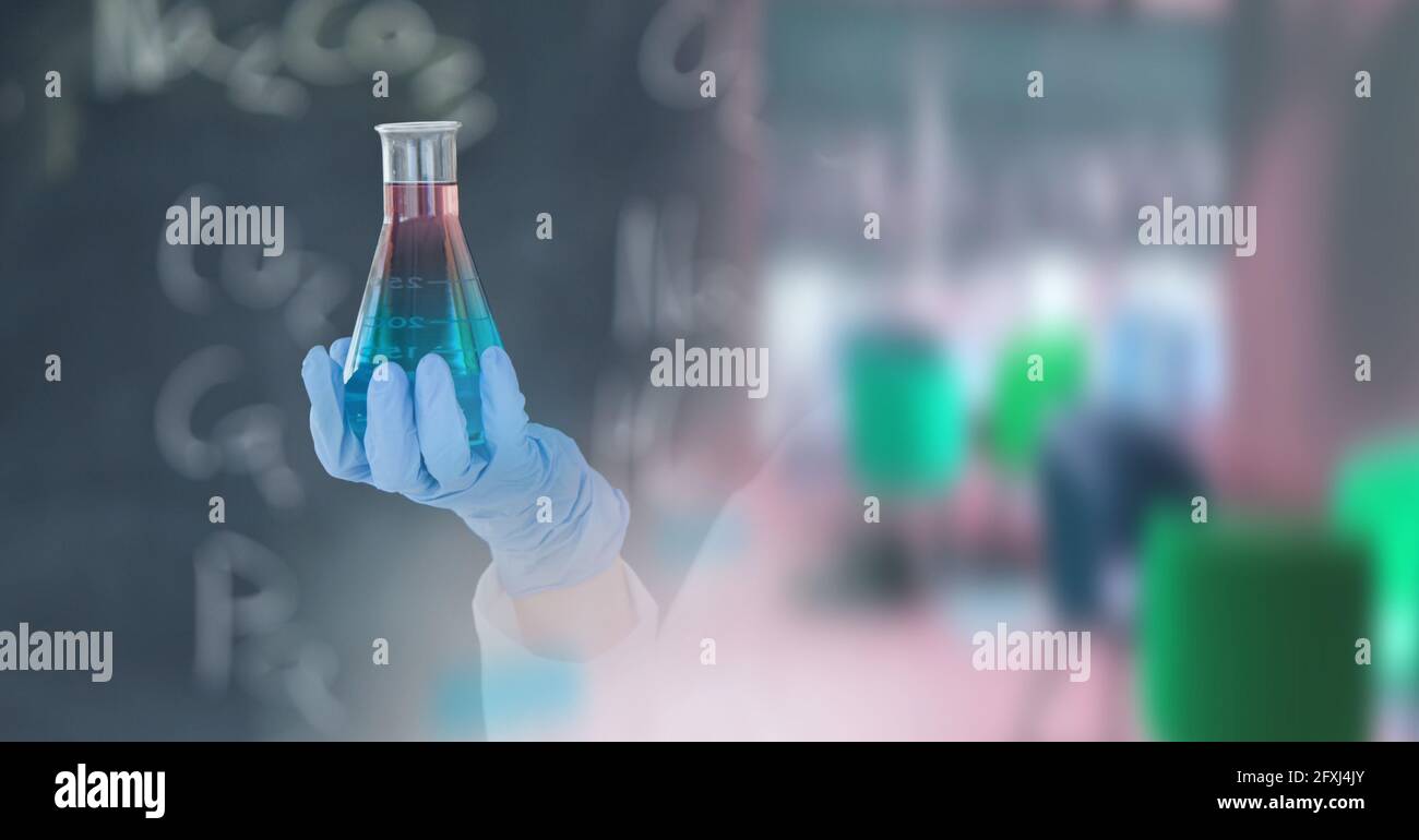 Composition of scientist holding beaker working in laboratory and copy ...