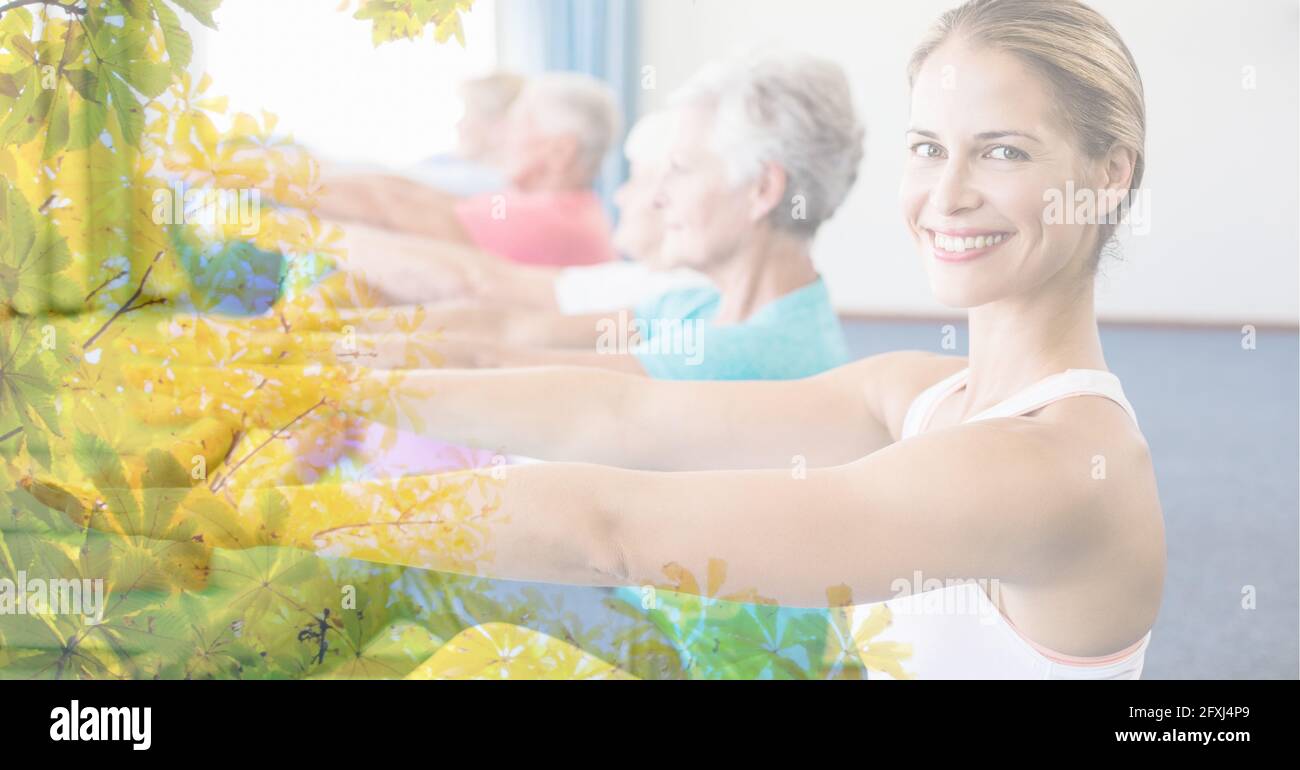Composition of female instructor and senior women exercising in fitness ...